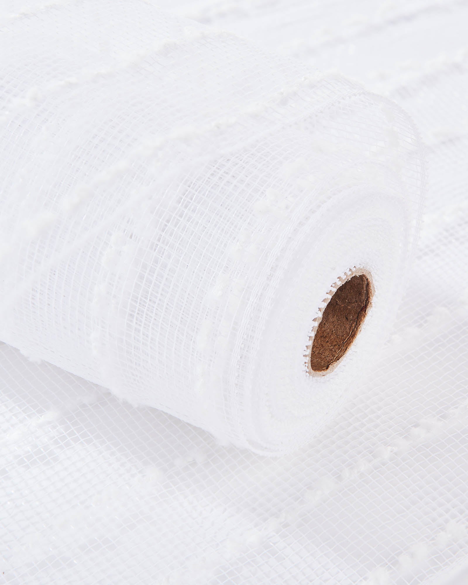 White Decorative Mesh Roll with White Dacron Lines, 9 m – We R Christmas